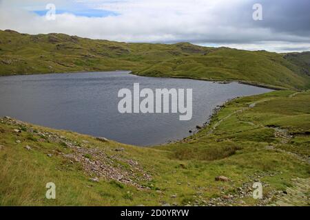 Views from Harrison Stickle slopes of Stickle Tarn Lake District Stock ...