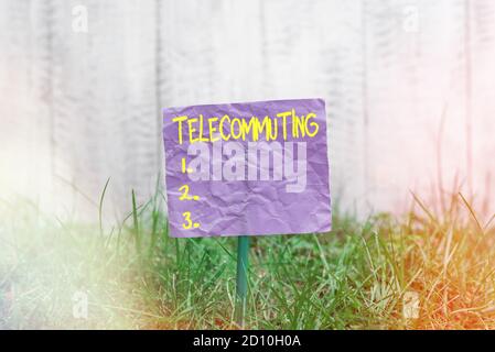 Conceptual hand writing showing Telecommuting. Concept meaning work at ...