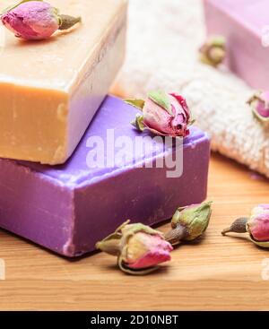 purple color Homemade natural soap bar on table Stock Photo - Alamy