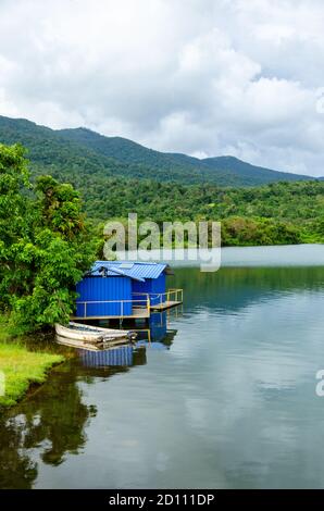 Serene view of Chapoli dam reservoir during monsoon season in Canacona ...