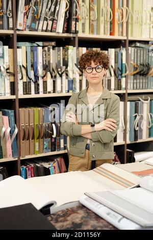 Smiling shop manager in front of her boutique Stock Photo - Alamy