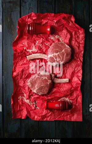 crumpled piece of black paper on the white table Stock Photo - Alamy