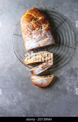 Overhead view of strudel cake on a wooden table outdoor. Bozen, Italy ...