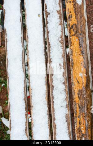Wooden ground slightly covered with snow Stock Photo - Alamy