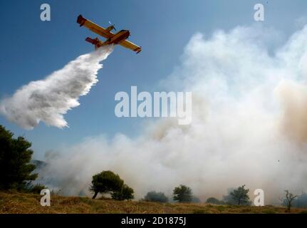 CANADAIR CL-415 FIRE FIGHTING WATER BOMBER OF THE GREEK AIR FORCE Stock ...