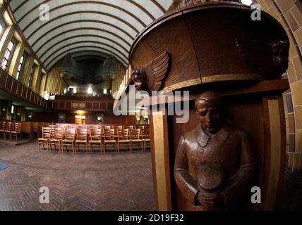 Wooden pulpit with Nazi symbolism, soldier, SA-man and Hitler Youth ...