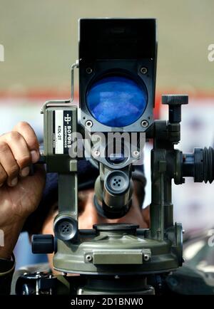 An Indian Army Soldier looks through a 84 MM RL Gun at a Forward Post ...