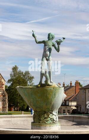 Boy figure on fountain outside St Michaels Church in Braintree, Essex ...