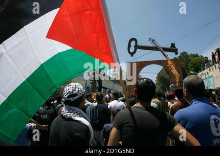 A key, symbol of the palestinian right of return, at the entrance of ...