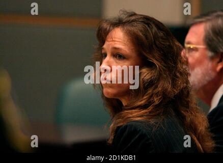 Air Force Capt. Colleen Shipman, right, moves through a crowd of ...