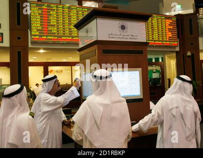 Traders at DFM Dubai Financial Market , Dubai World Trade Centre ...