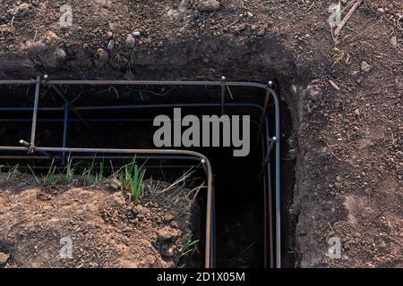 Reinforcement of corners for creating strip foundation for new house ...