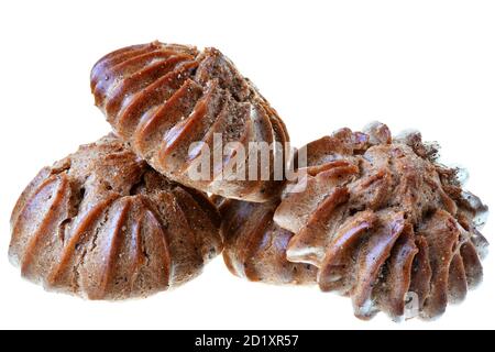 Heap of freshly baked brown eclairs isolated on a white background ...