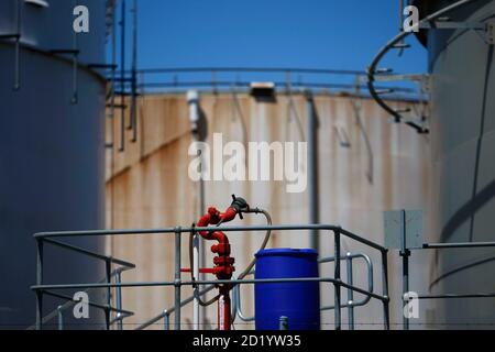 Oil refinery and fire hydrant. Oil refinery in Malaysia Stock Photo - Alamy
