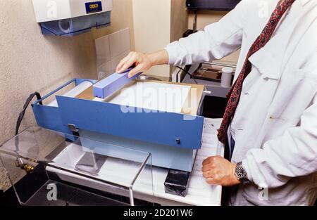 Demonstration of an ESDA machine being used to see indentations of ...