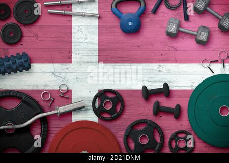 Denmark gym concept. Top view of heavy weight plates with iron bar on ...