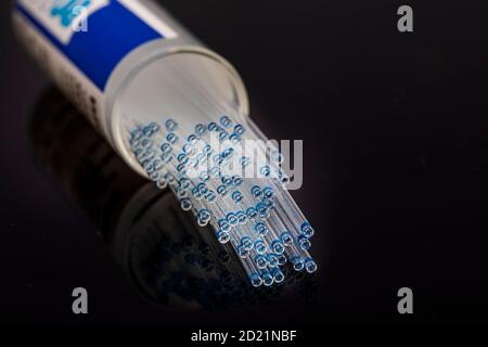 Hematocrit Capillary Tube. Medical capillary glass tubes on black ...