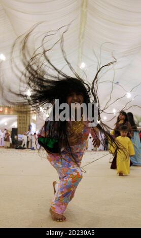 Traditional Arab `hair dance` Abu Dhabi, United Arab Emirates Stock ...
