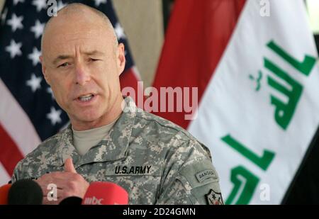U.S. Army General Frank Helmick gestures at a press conference on the ...