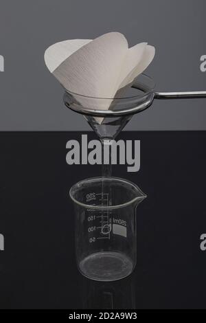 Filter paper in laboratory. Scientists are chemical filtration by ...