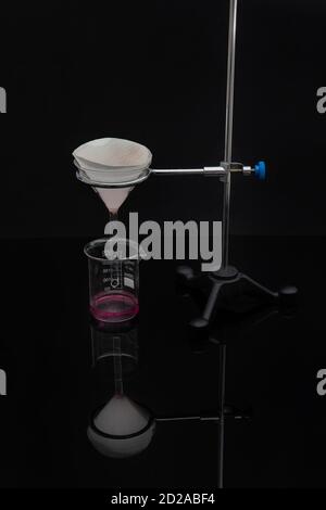 Filter paper in laboratory. Scientists are chemical filtration by ...