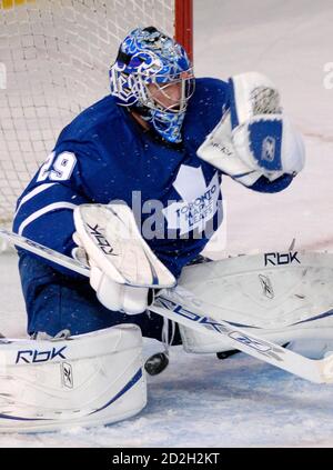 Toronto Maple Leafs goaltender Justin Pogge makes the save on a shot by ...