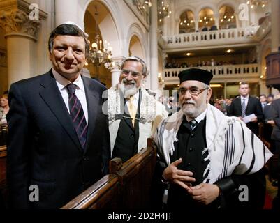 The Chief Rabbi Sir Jonathan Sacks (centre) after receiving his ...