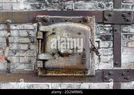 Rusty steel bolted hatch Stock Photo - Alamy
