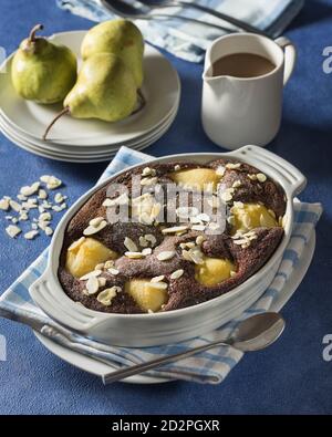 Pear and chocolate pudding Stock Photo - Alamy