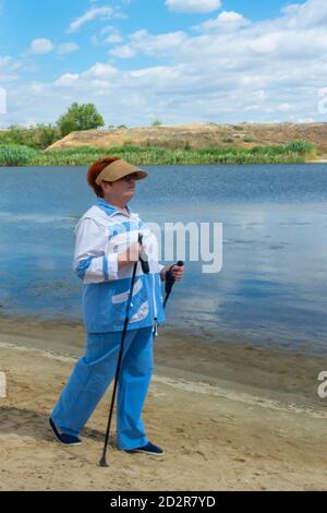 Nordic walking, senior active elderly people involved in sports go ...