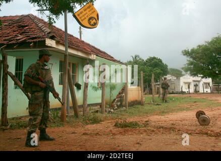 A bullet-riddled building in war-ravaged Angola Stock Photo - Alamy