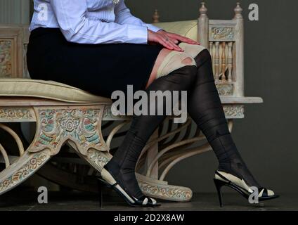 A pair of Queen Victoria's black and white silk stockings, which at ...