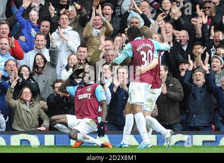 West Ham United's Demba Ba (left) heads home the opening goal of the ...