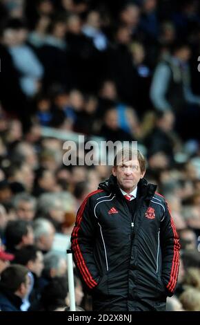Kenny Dalglish looks on during the Premier League match at Craven ...