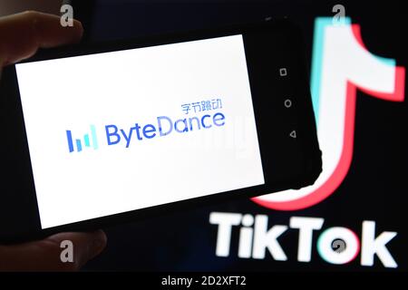TikTok and ByteDance logos displayed on screens in London, UK Stock ...