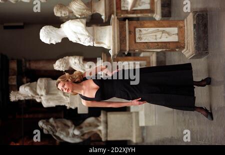 Model Maxine Restall, presents a 1950's style Bruce Oldfield-Black ...