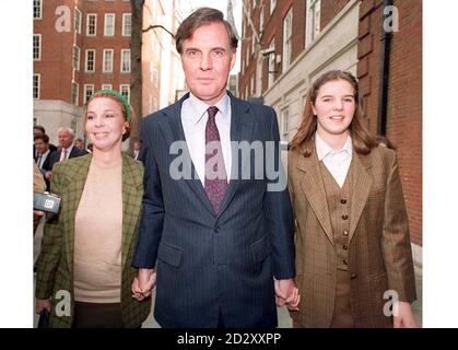 Chief secretary to the Treasury Jonathan Aitken leaves a news ...