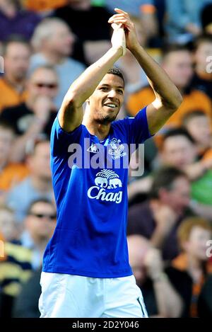 Everton's Jermaine Beckford (L) celebrates scoring his sides first goal ...