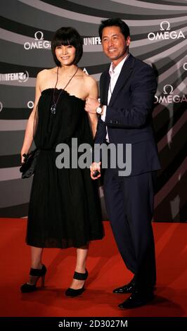 Hong Kong singer and actor Wong Cho Lam, right, actress Irene Wan pose ...