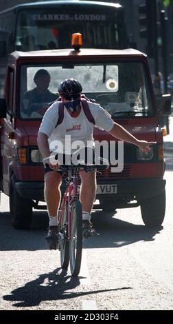 Cyclist With Anti-Pollution Mask London Stock Photo - Alamy