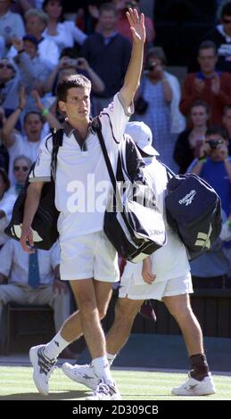 No Commercial Use: Tim Henman waves to the Centre Court crowd after ...