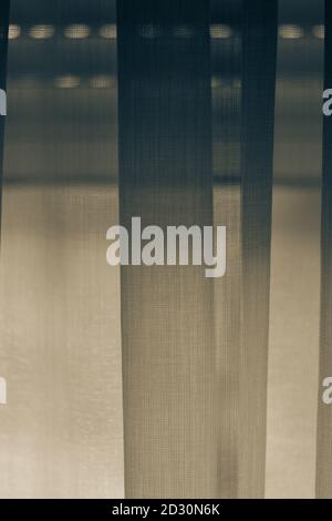 Pale shadows behind the curtain Stock Photo - Alamy