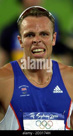 Great Britain's Dean Macey is exhausted after winning the 400m section ...