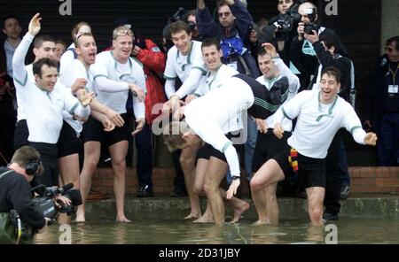 Cox Christian Cormack is thrown into the river as Cambridge celebrates ...
