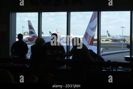 British Airways planes outside the window of Heathrow Airport's ...