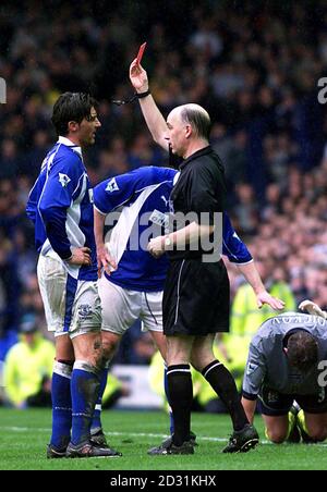 Referee David Elleray shows Manchester United's Roy Keane the red card ...
