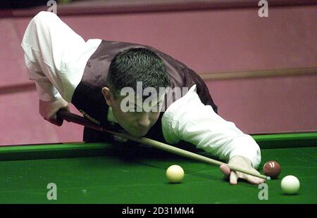 John Parrott in action in his opening round match against Michael Judge ...