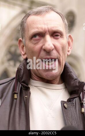 Paul Cleeland, from Stevenage in Hertfordshire, stands outside the ...