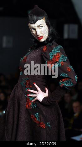Model on the catwalk for the Arkadius fashion show at London Fashion ...