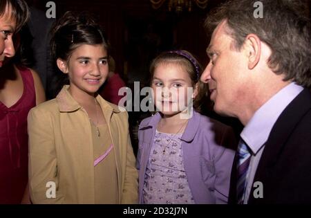 Cherie Blair with Alice Maddocks (centre), sister Chloe (3rd right) and ...